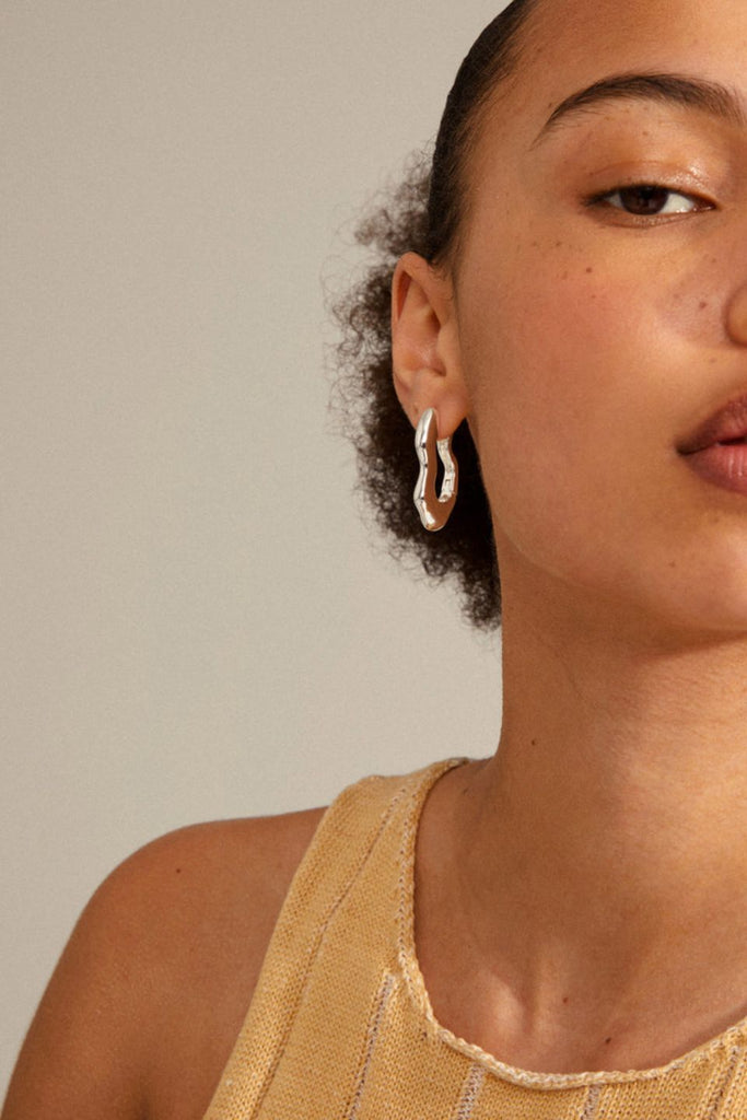 Shop Wave Recycled Wavey Hoops Silver-Plated EOL Earrings | Flo & Fran
