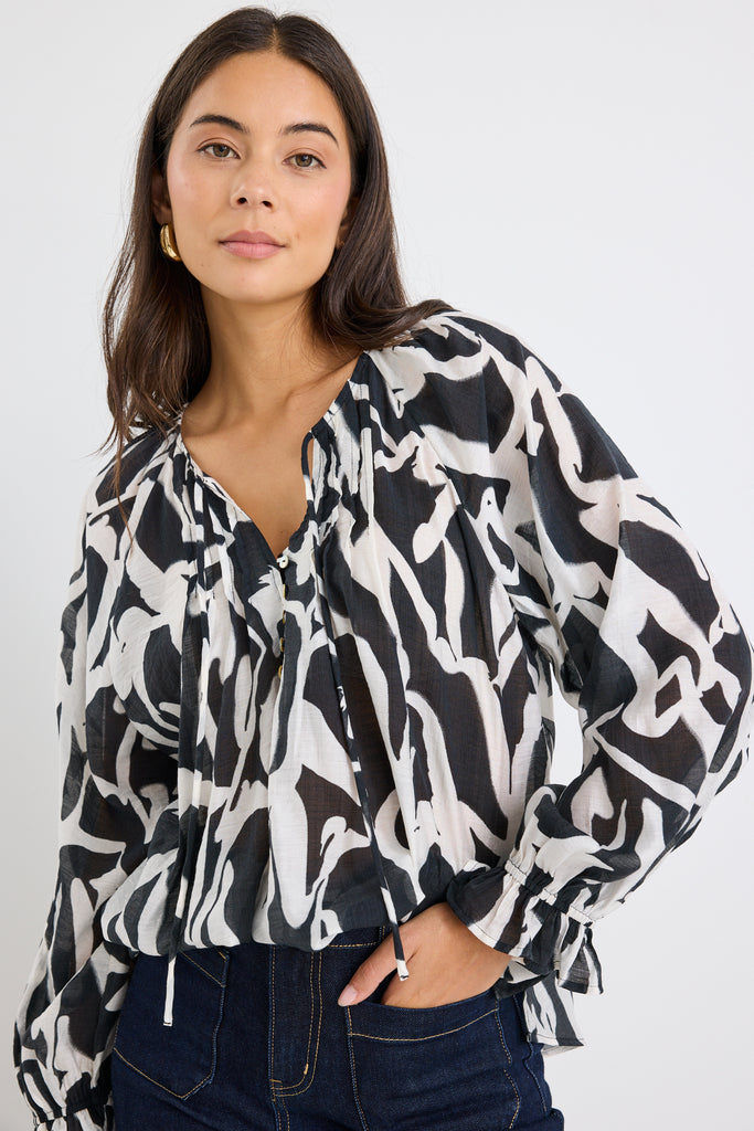 Shop Refine Black Cream Squiggle Pintuck Front LS Top | Flo & Frankie